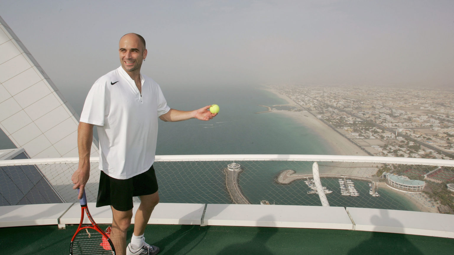 The special match between Roger Federer and Andre Agassi which happened ...