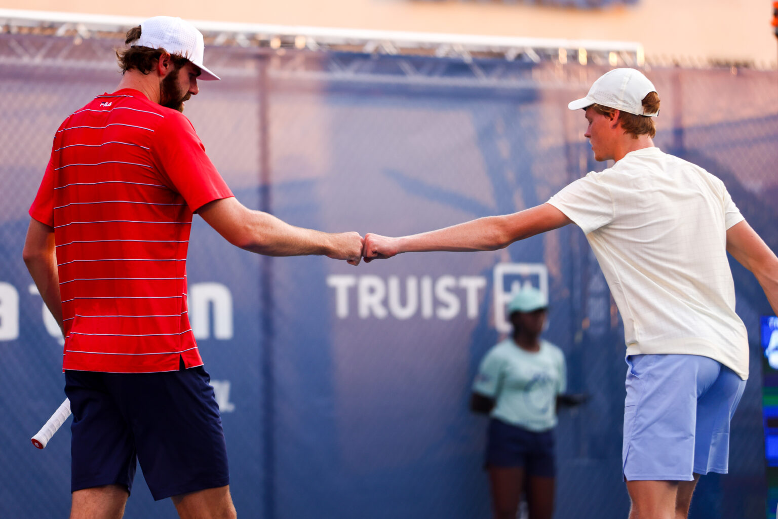 Reilly Opelka reacts as he and Jannik Sinner lose their first doubles ...